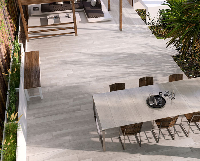 IRIS CERAMICA presents the new contemporary graphic collection SYNC ...
